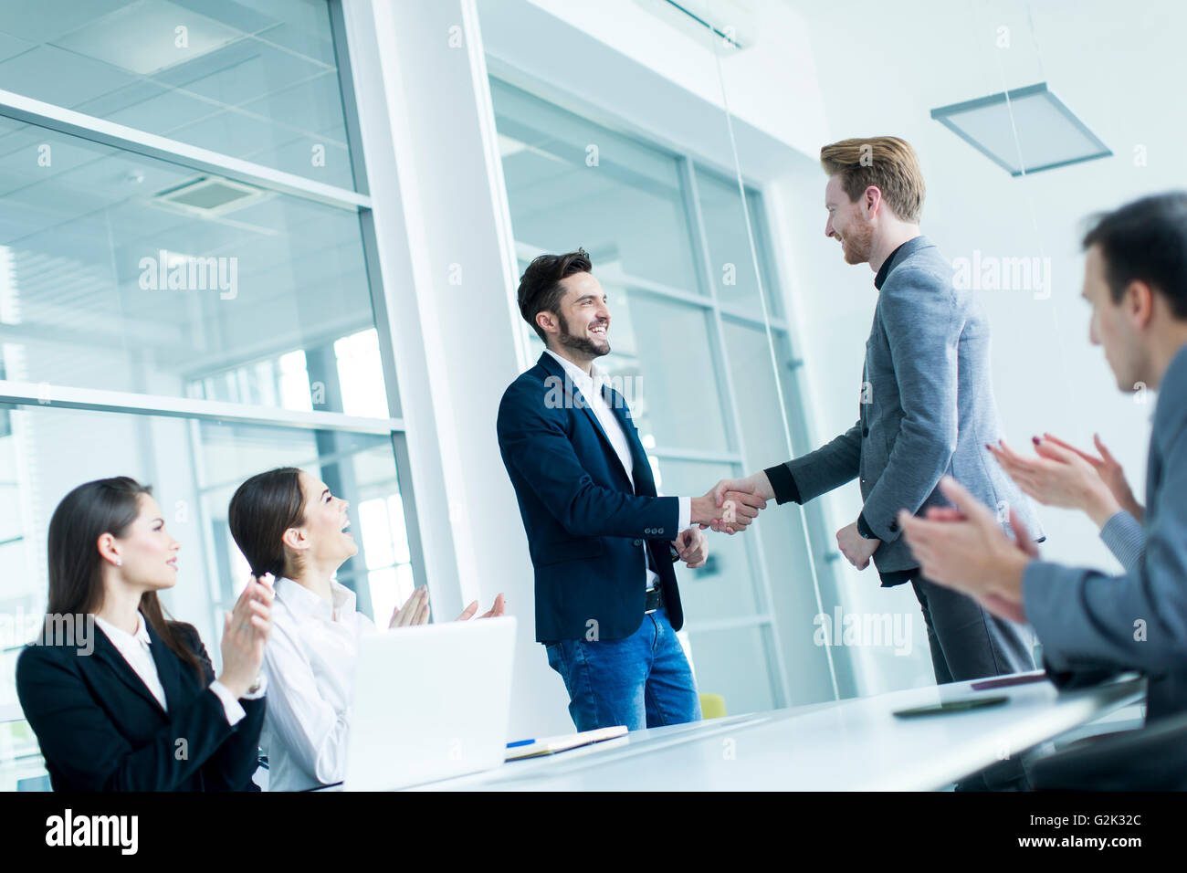 Business people shaking hands in the office Stock Photo - Alamy
