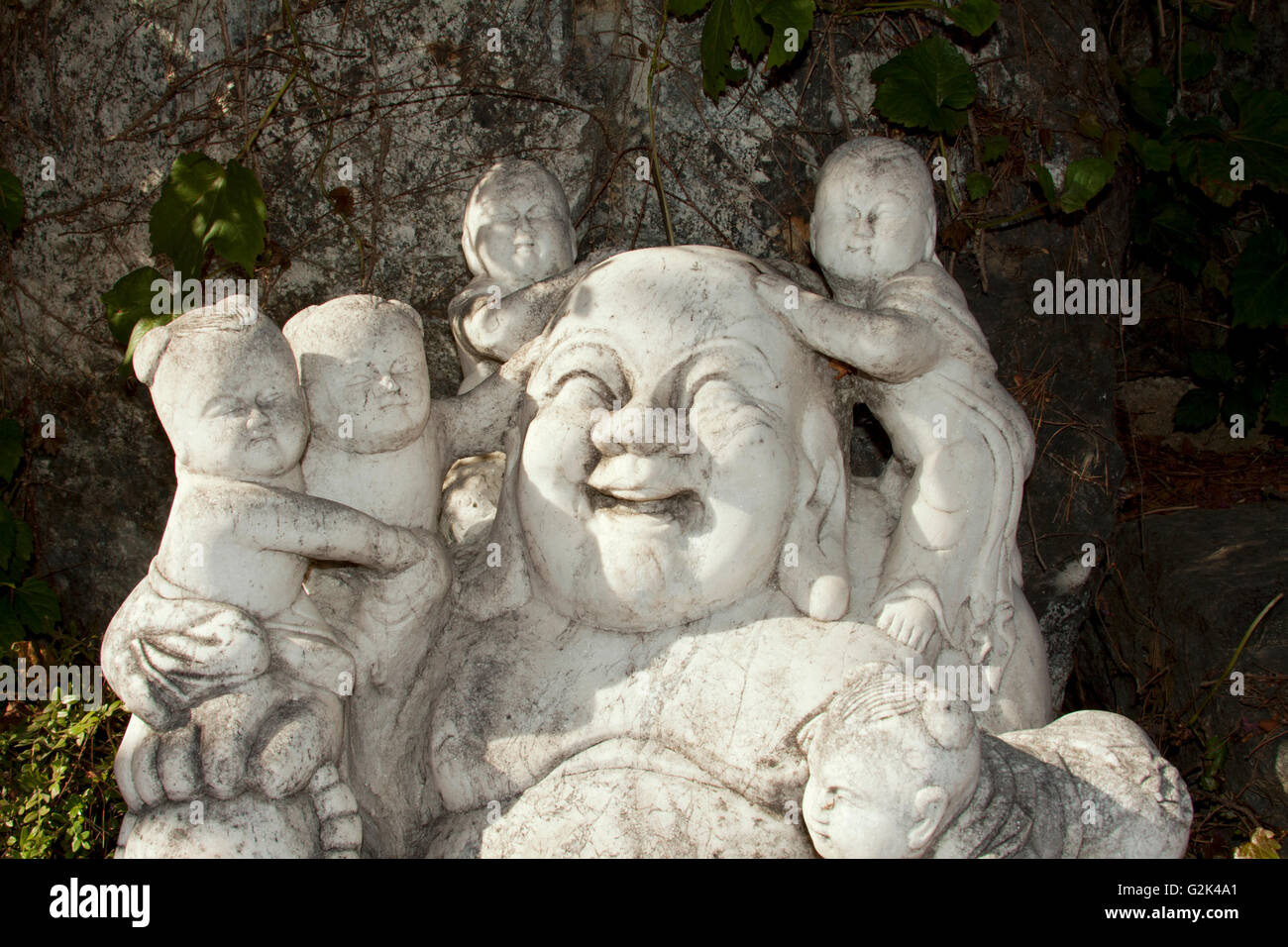 Stone buddha statue Stock Photo - Alamy