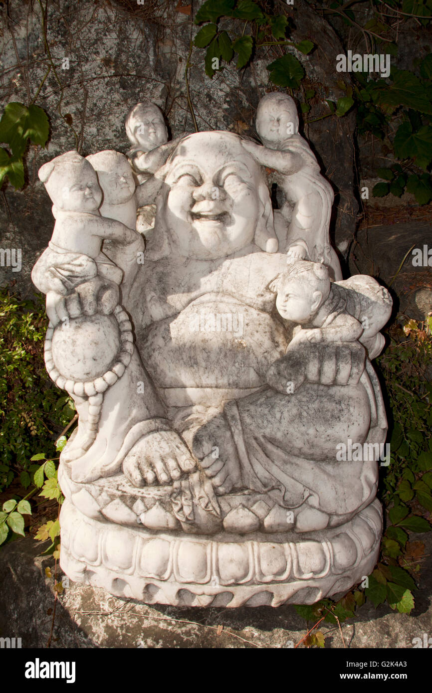 Stone buddha statue Stock Photo - Alamy