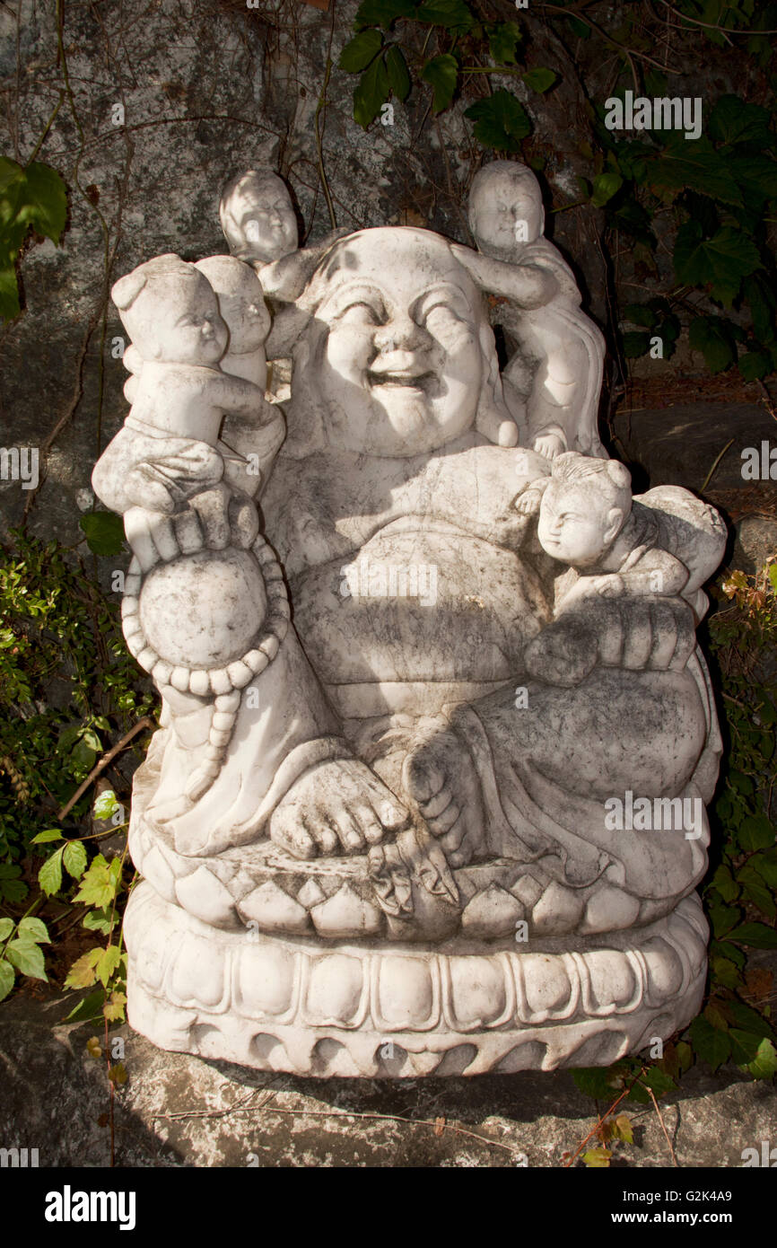 Stone buddha statue Stock Photo - Alamy