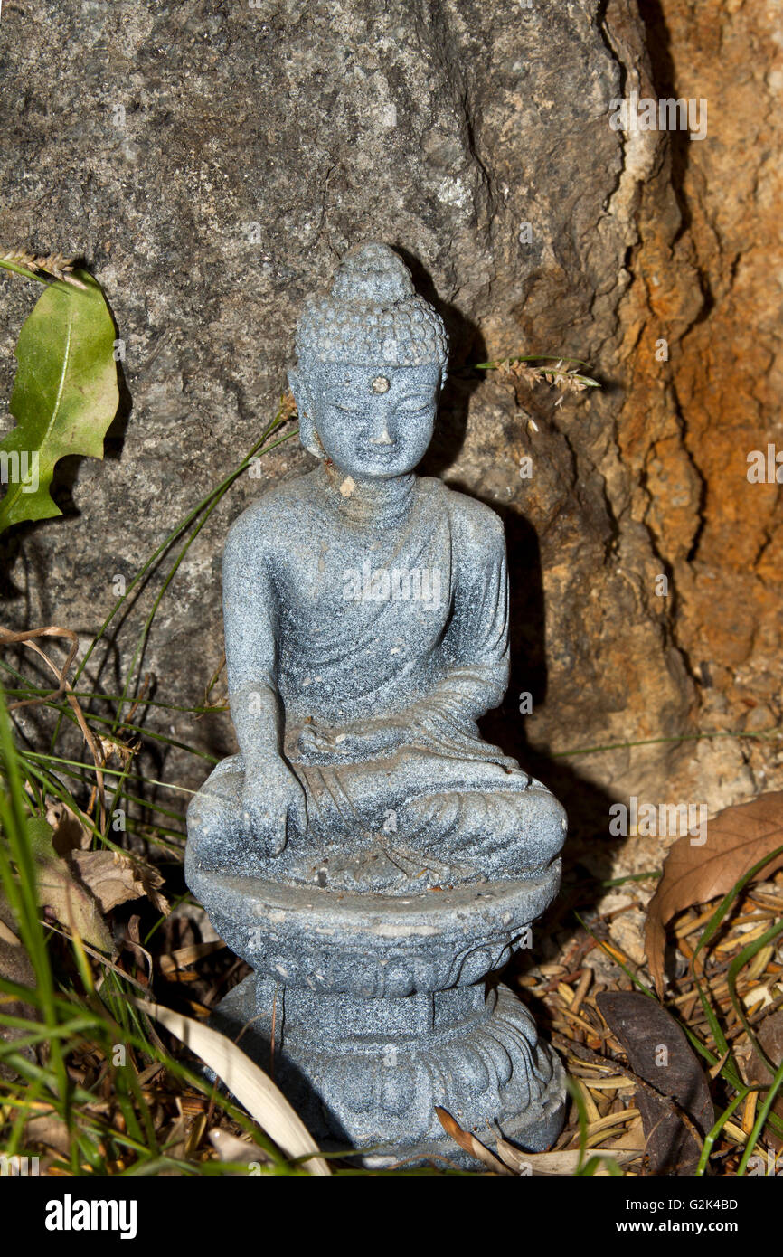Stone buddha statue Stock Photo - Alamy
