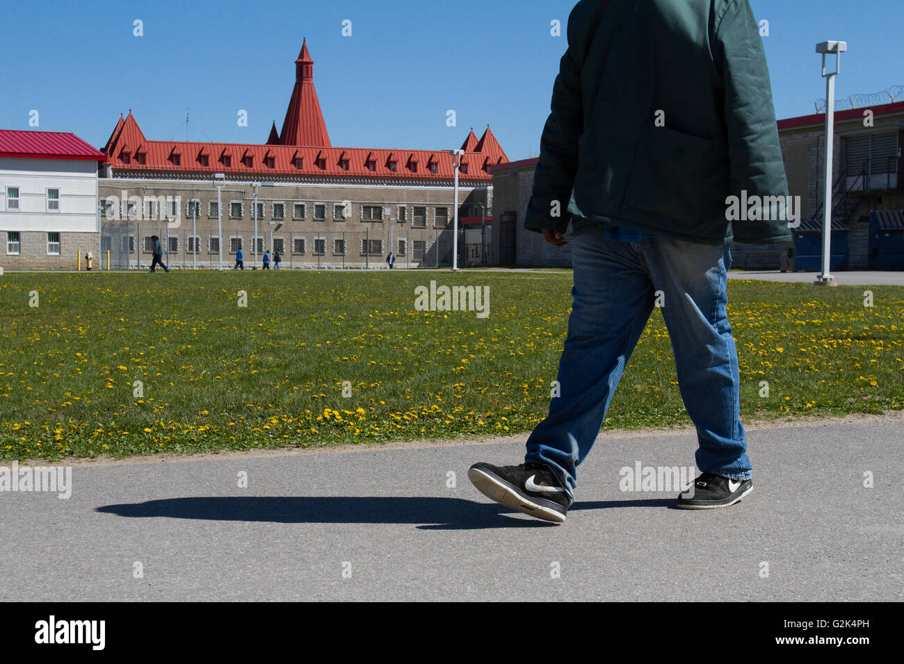 An inmates walks around inside the Collins bay penitentiary in Kingston ...