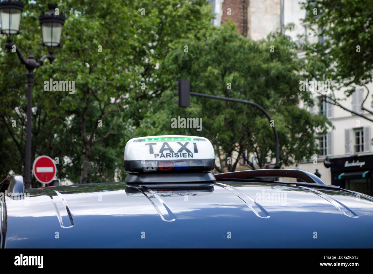 Paris taxi sign Stock Photo - Alamy