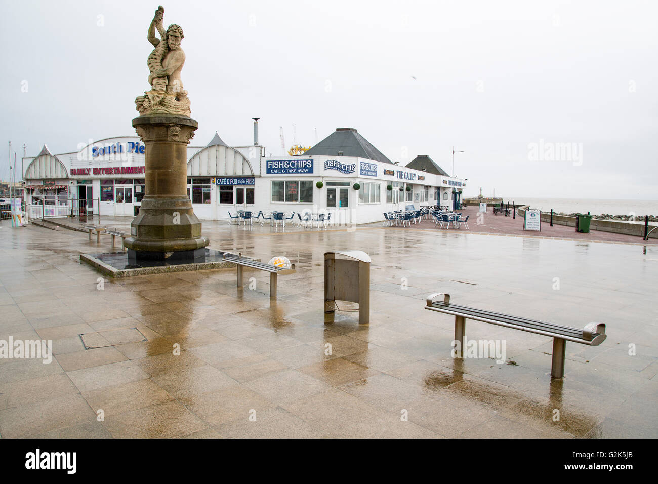 nertune statue on a wet windy day lowestoft Stock Photo - Alamy