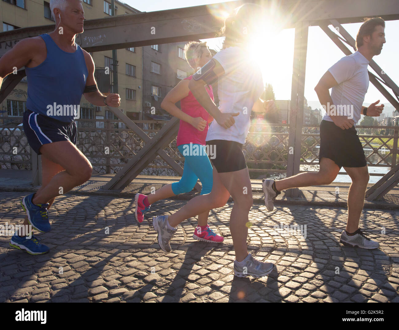 people group jogging runners team on morning training workout with ...