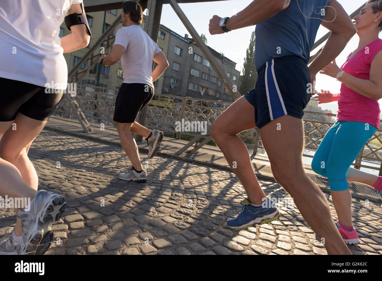 people group jogging runners team on morning training workout with ...