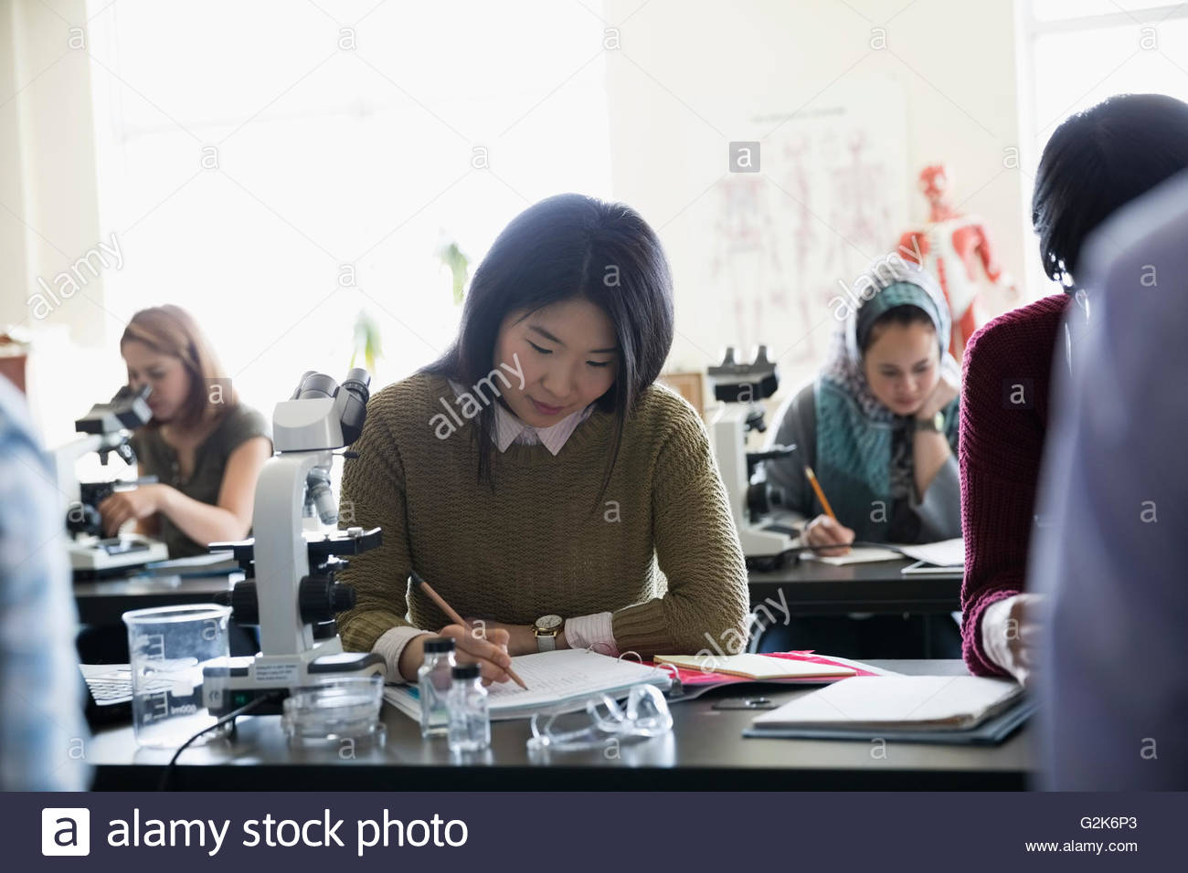 Taking notes in class hi-res stock photography and images - Alamy