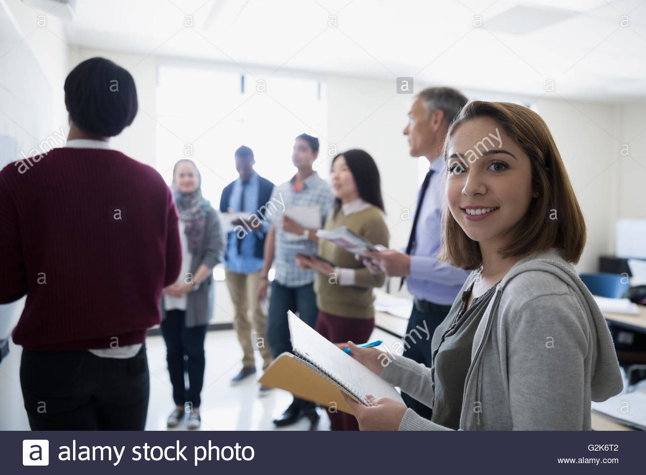 Taking notes in class hi-res stock photography and images - Alamy