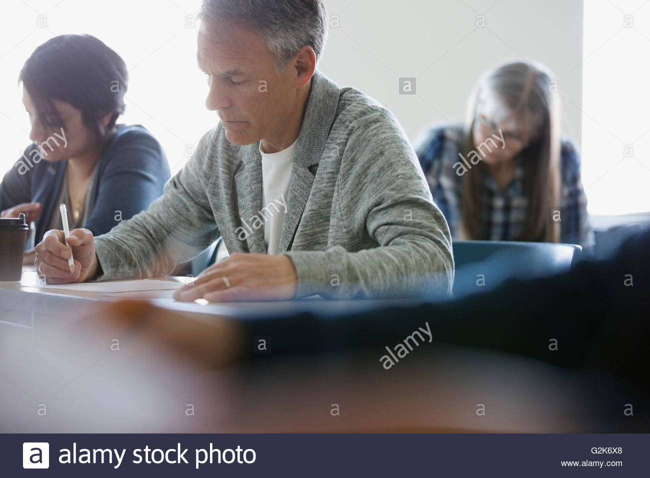 College students taking exam hi-res stock photography and images - Alamy