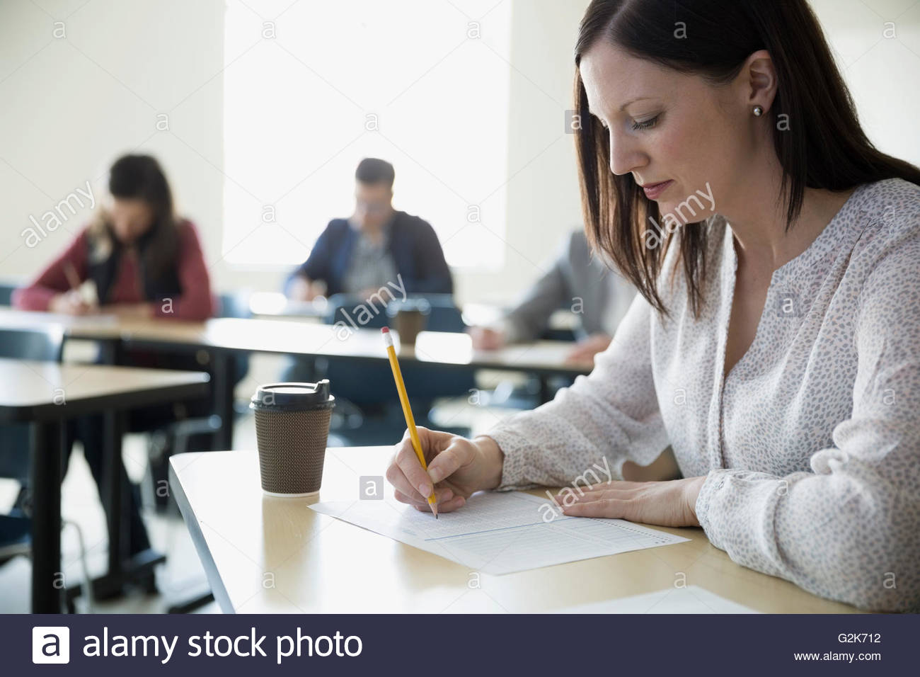Student test college desk hi-res stock photography and images - Alamy