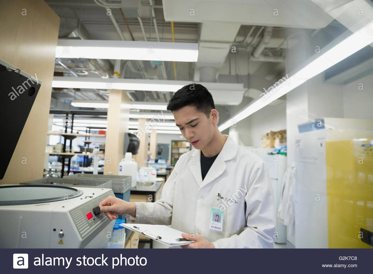 Asian scientist using equipment hi-res stock photography and images - Alamy