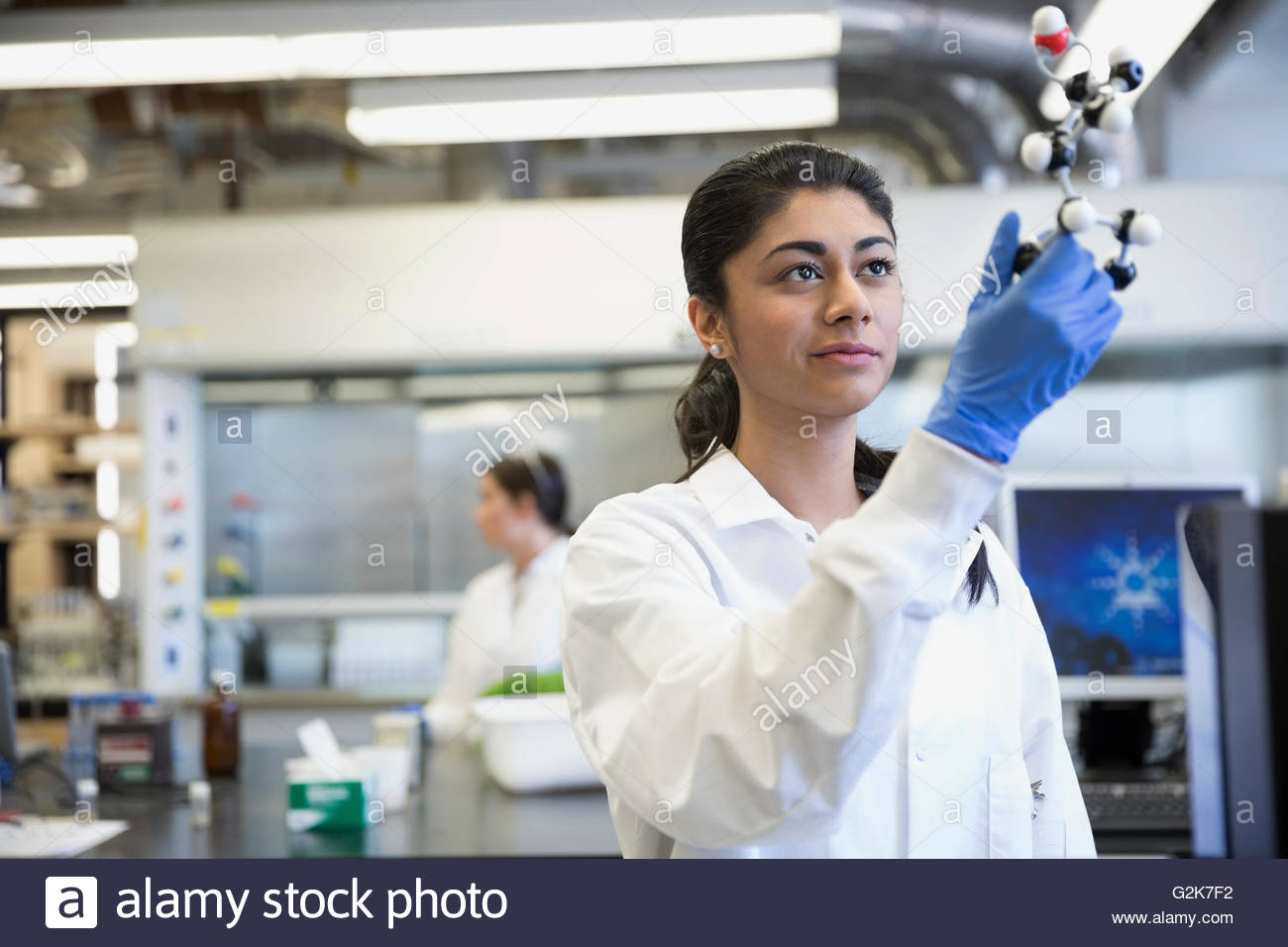 Student examining molecular model hi-res stock photography and images ...