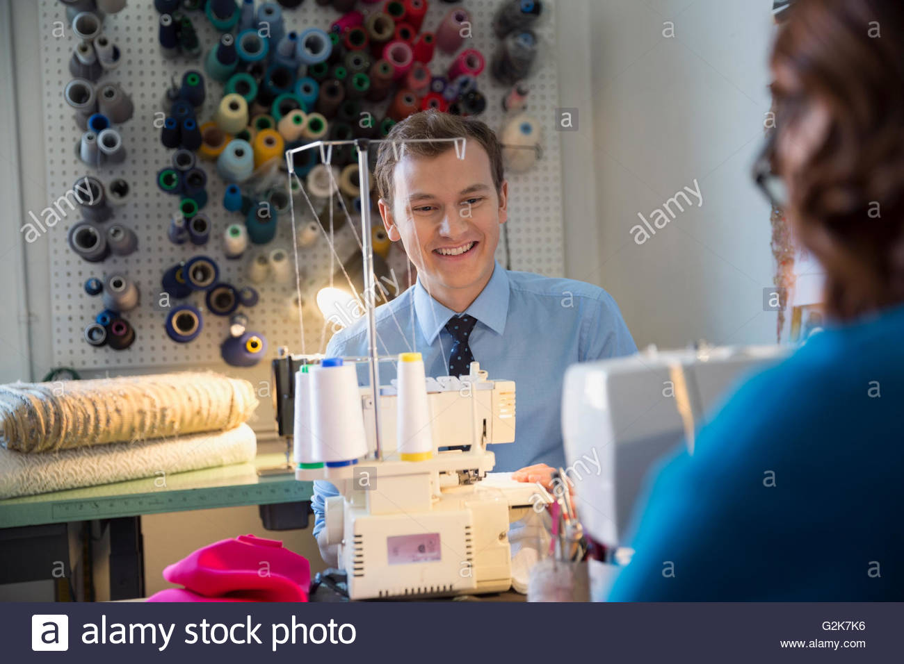 Dressmakers using sewing machines Stock Photo - Alamy