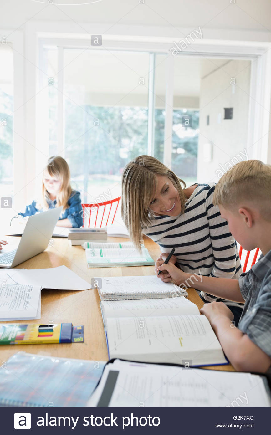 Mother helping son with homework hi-res stock photography and images ... Mother helping son with homework hi-res stock photography and images ...