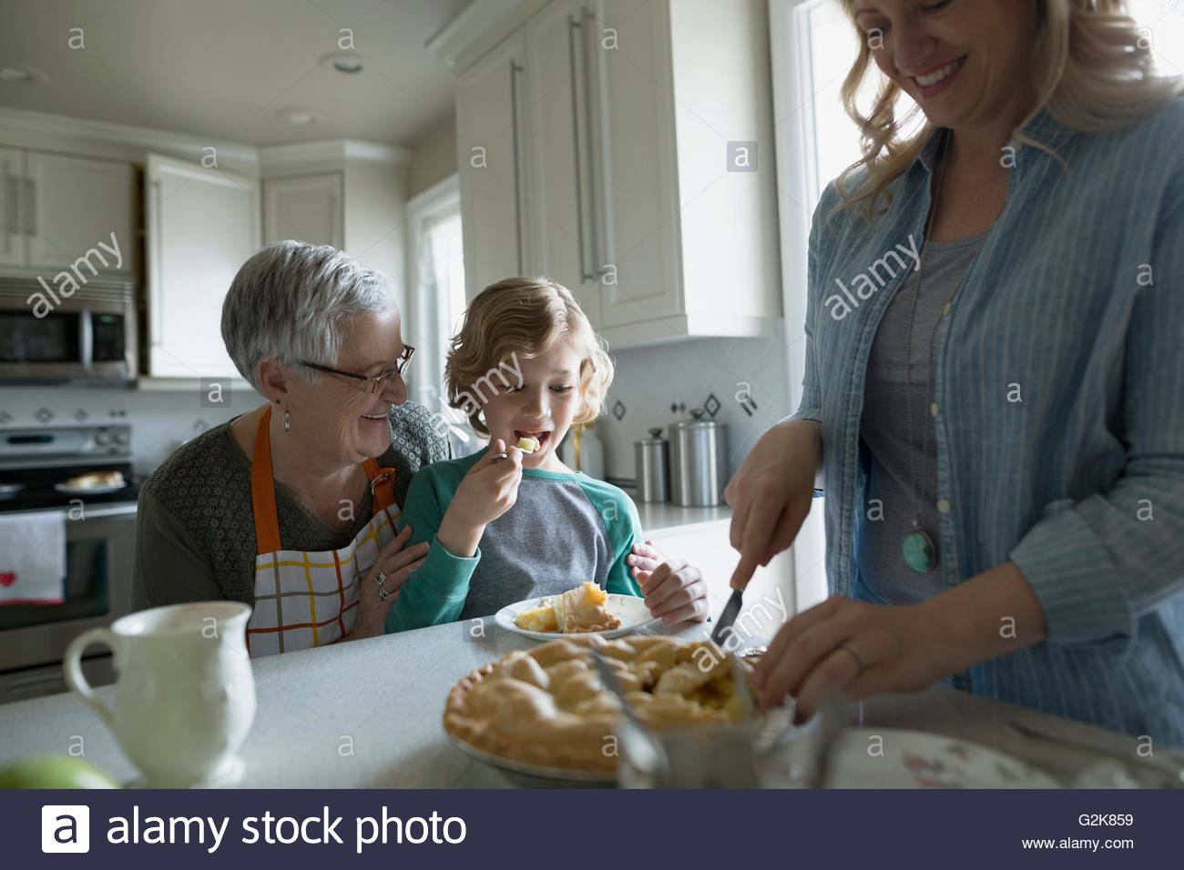 Boy eating pie hi-res stock photography and images - Alamy