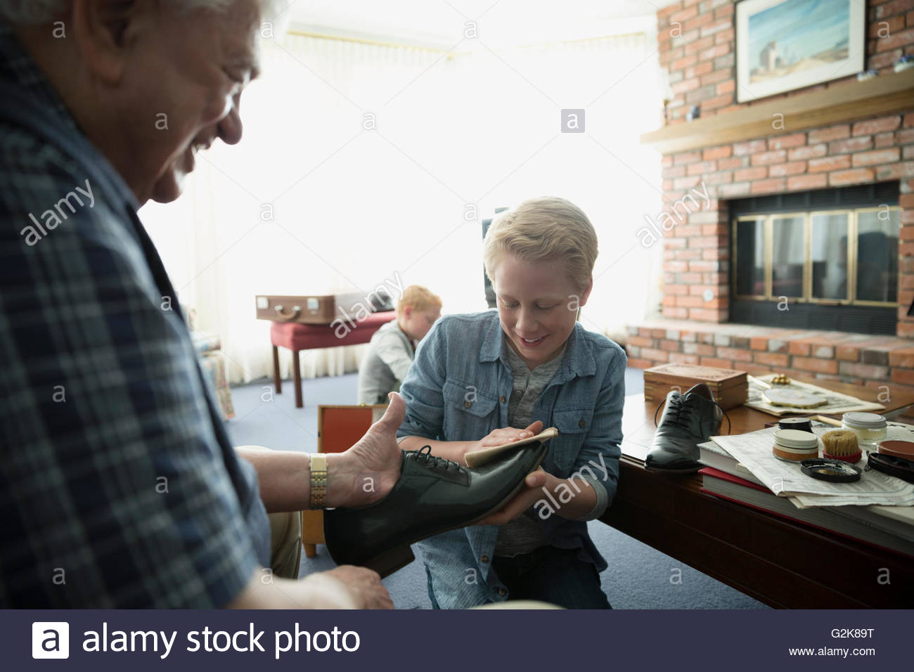 Boy polishing shoes hi-res stock photography and images - Alamy