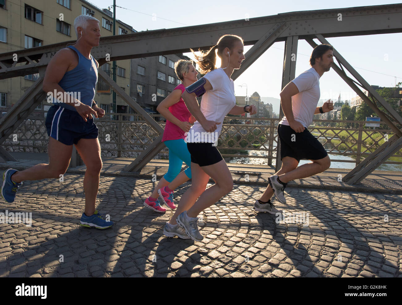 people group jogging runners team on morning training workout with ...
