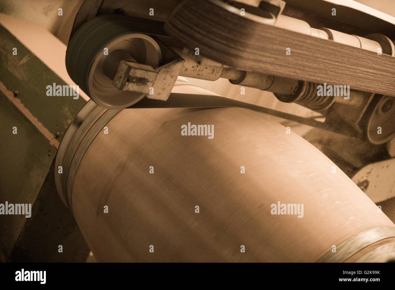 Cleaning a barrel with sanding machine Stock Photo - Alamy