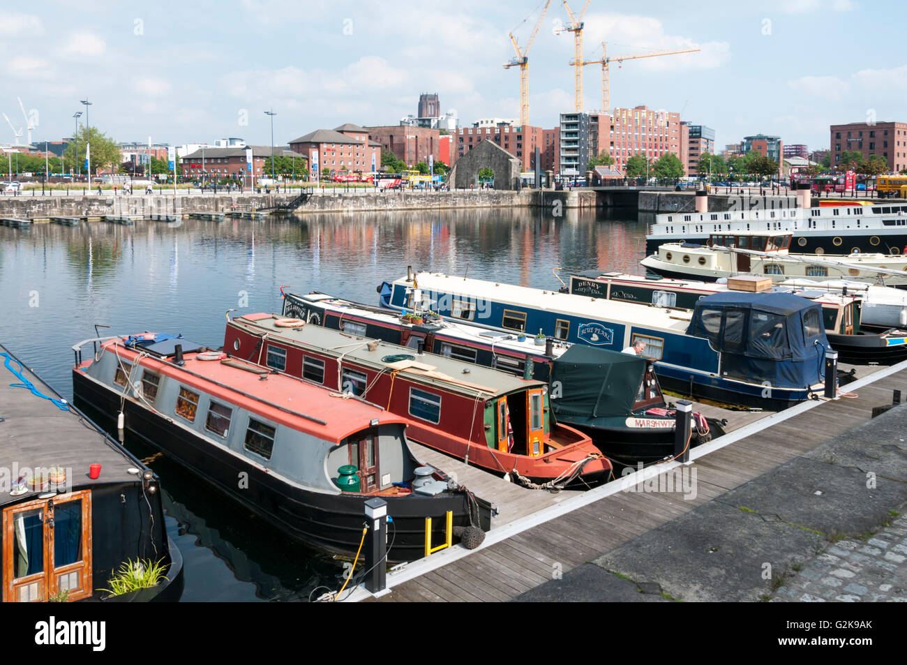 Canal narrowboats moored in the Grade II listed Salthouse Dock ...