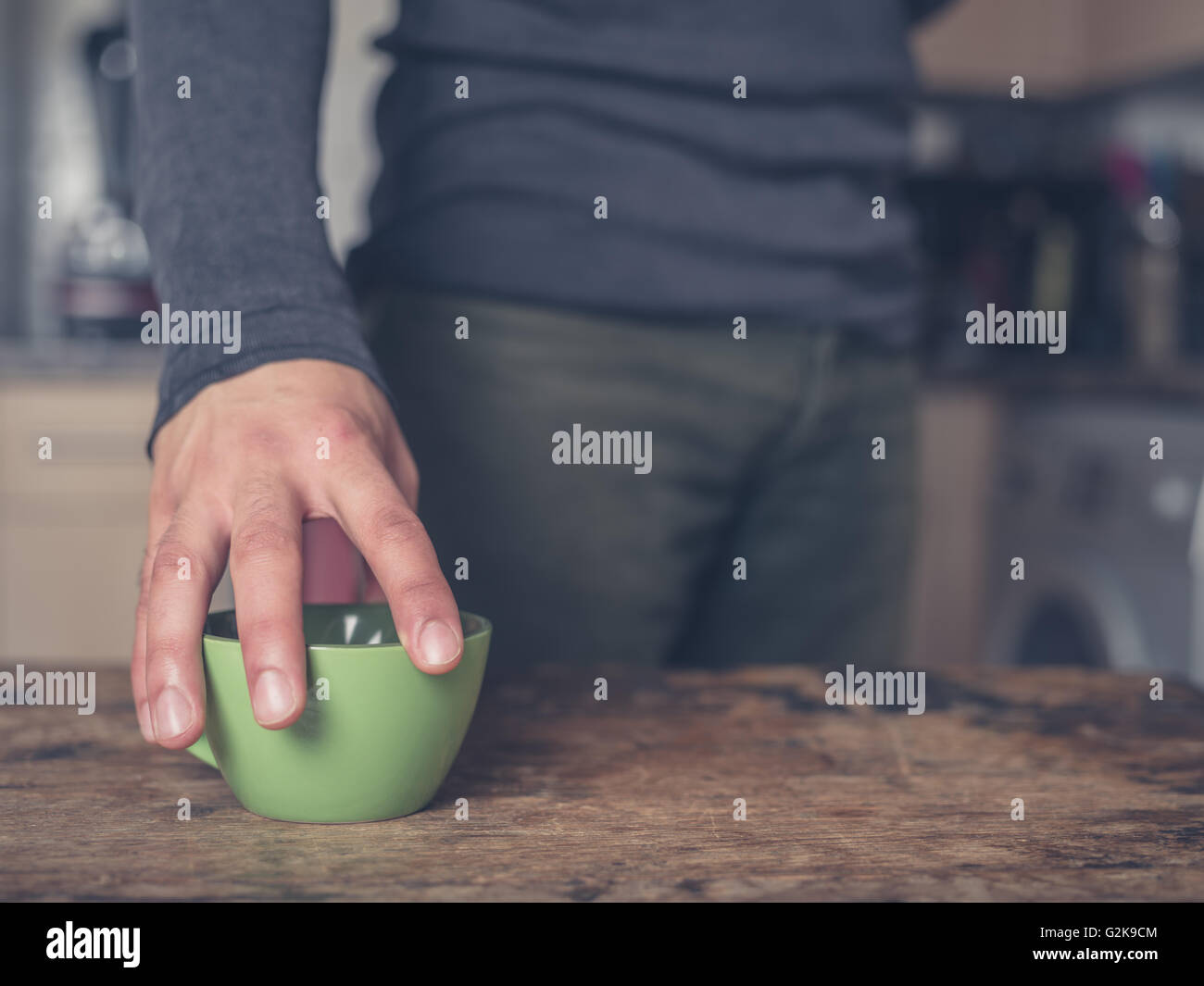 Placing the cup hi-res stock photography and images - Alamy