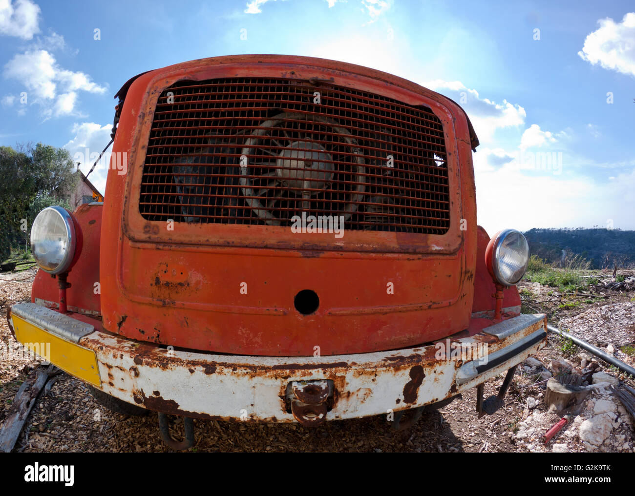 red old and rusty firetruck front closeup Stock Photo - Alamy
