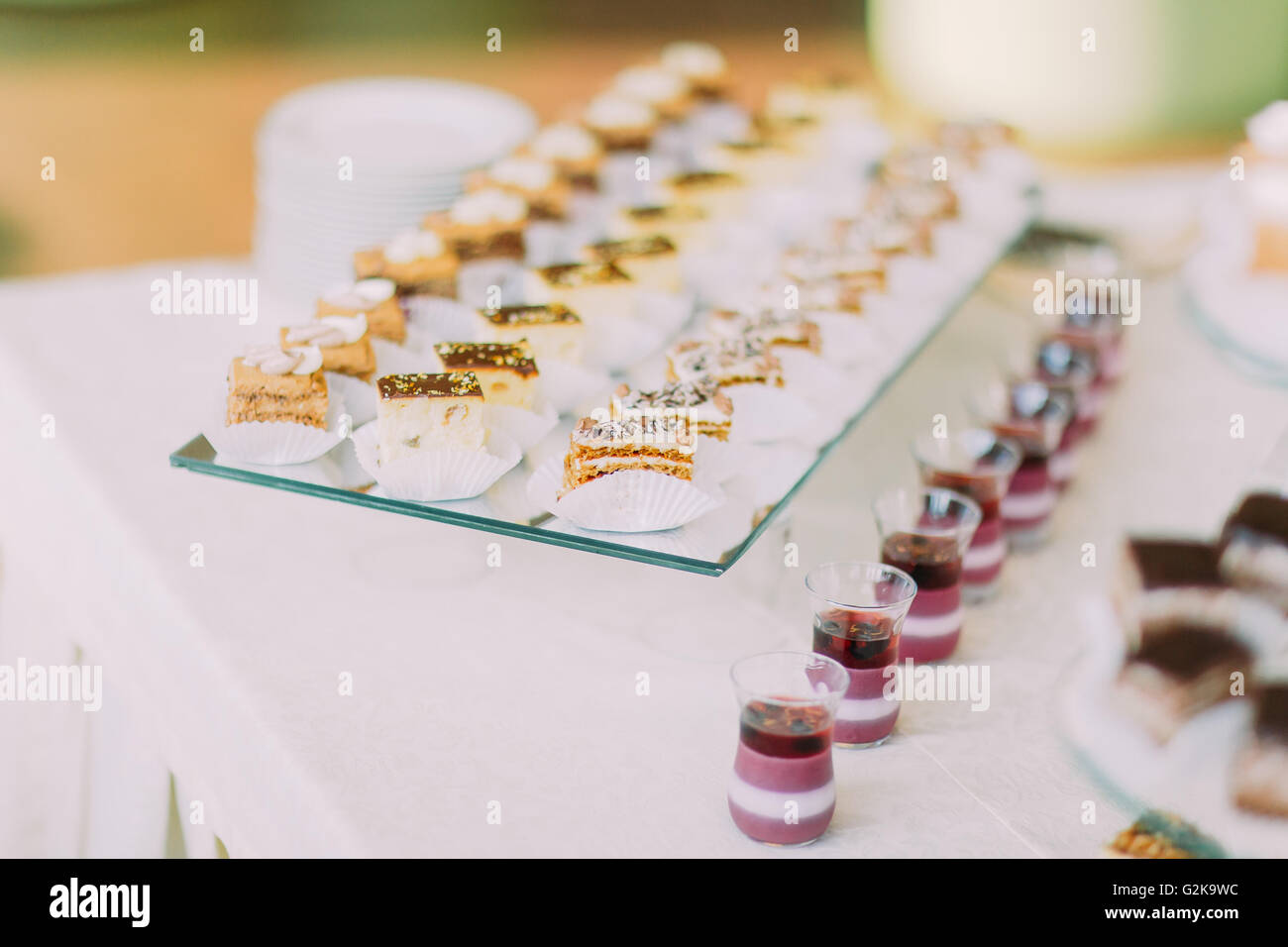 Dessert buffet with delicious sweet chocolate icing bakery on snow ...