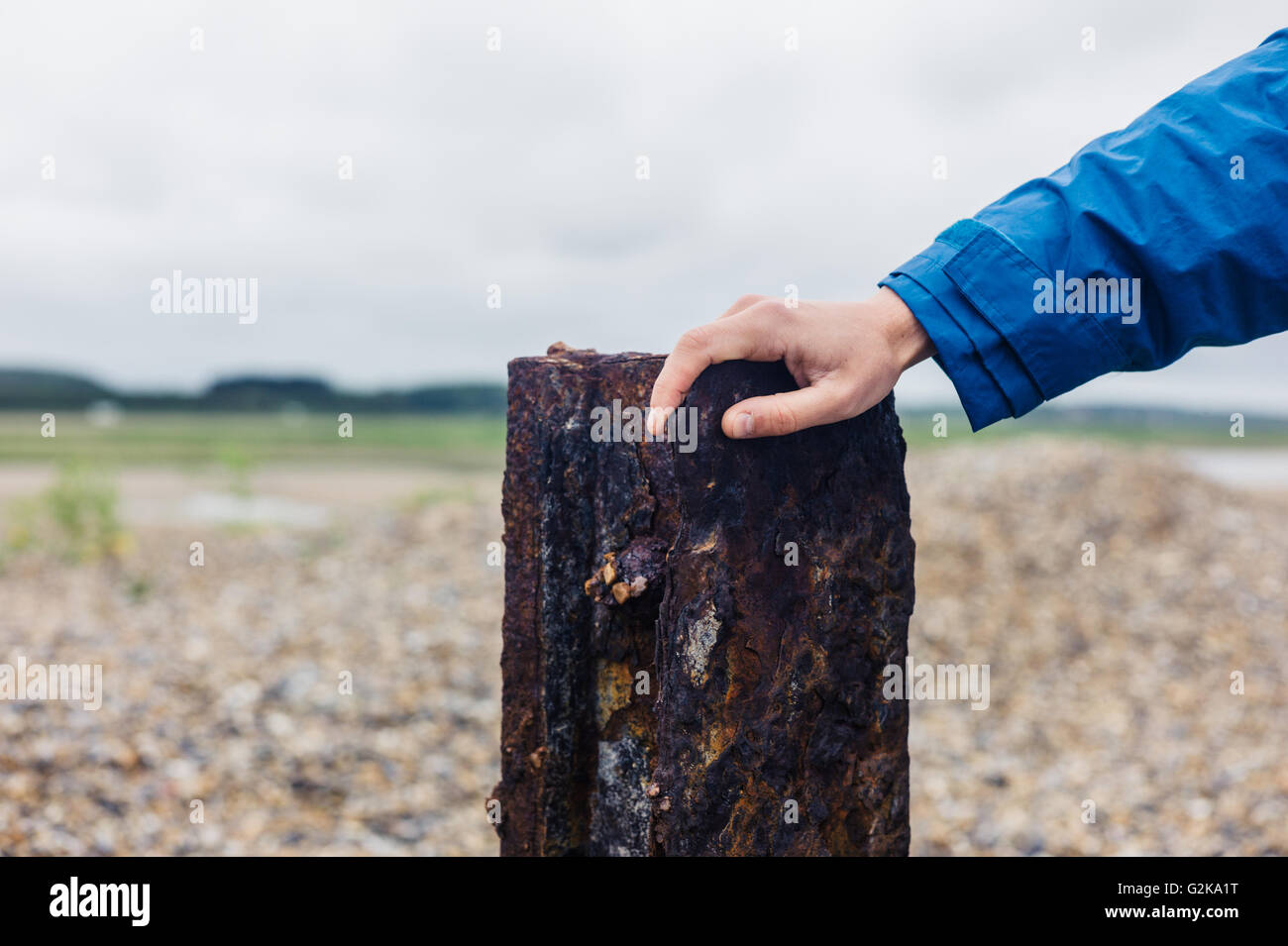 Hand resting on beach hi-res stock photography and images - Alamy