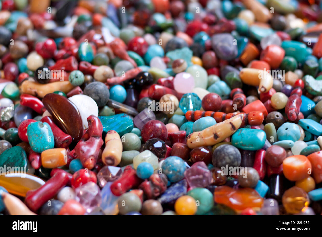 a bunch of small color beades macro shot Stock Photo - Alamy