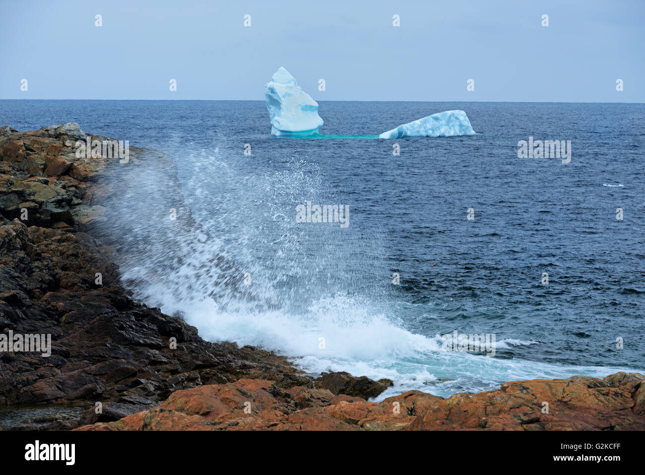 Waves crashing and icebergs floating in the Atlantic Ocean Cape ...