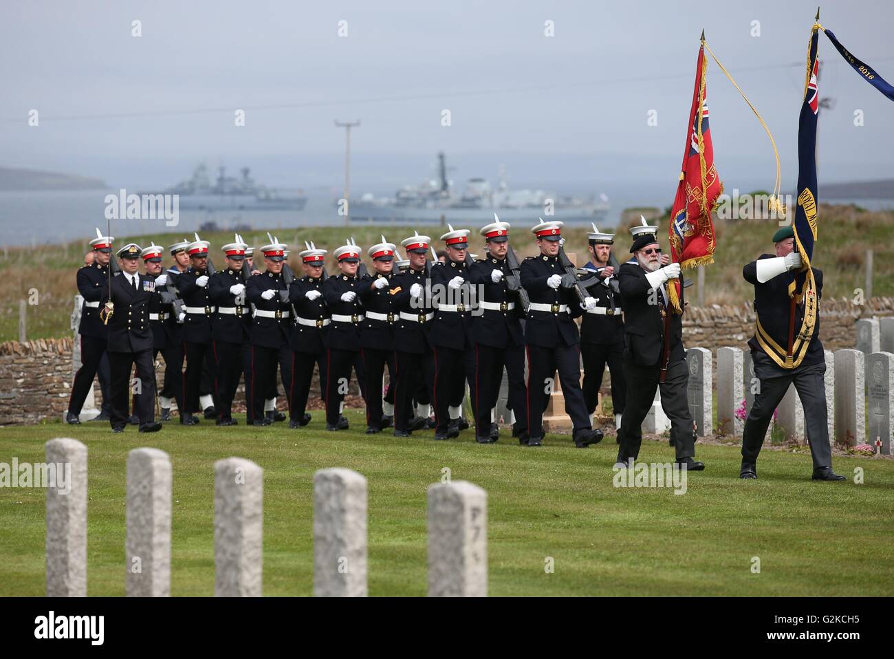 Sailors take part in a service at Lyness Cemetery on the island of Hoy ...
