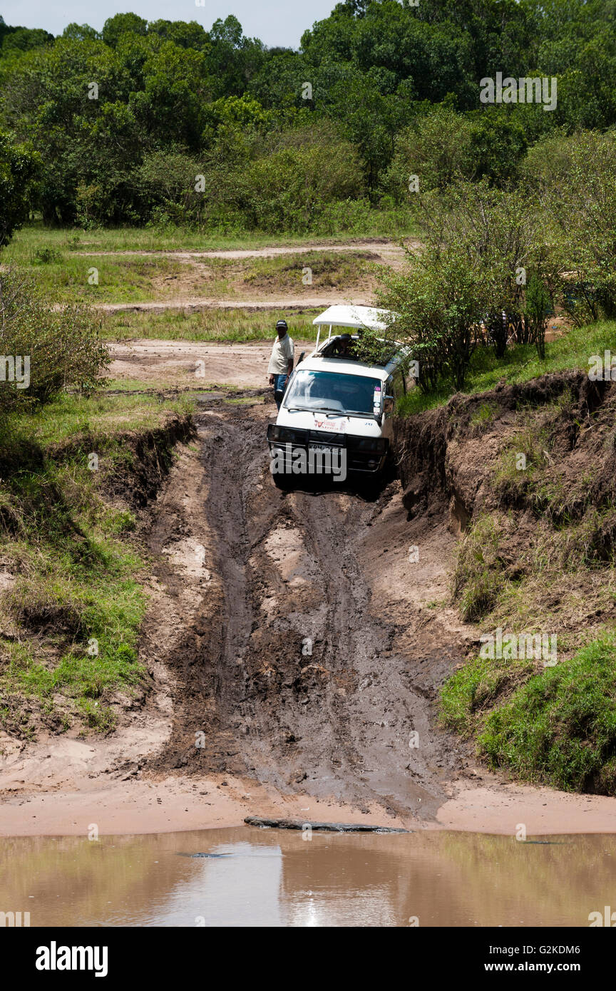 Minibus stuck in mud, Masai Mara, Rift Valley Province, Kenya Stock ...