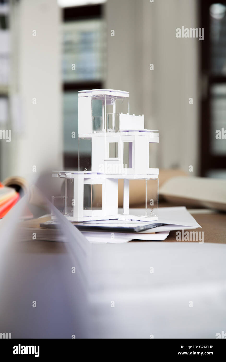 Desktop with architectural model Stock Photo - Alamy