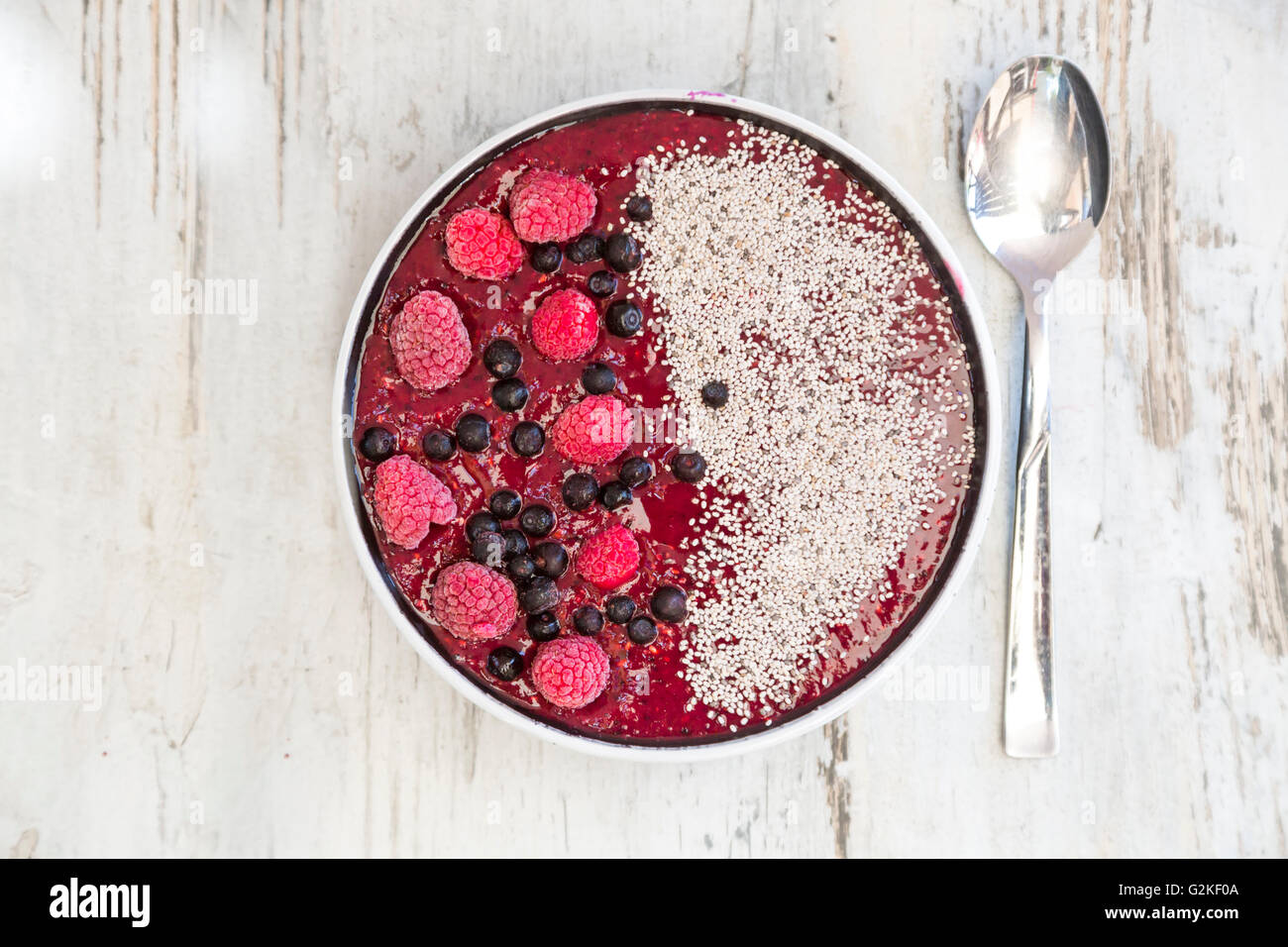 Raspberry blueberry smoothie bowl with white chia seeds Stock Photo - Alamy