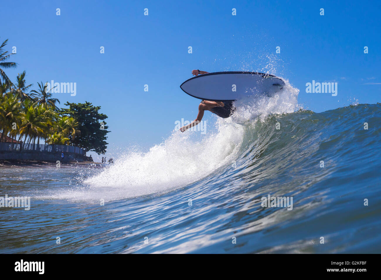 Indonesia, Bali, surfer on wave Stock Photo - Alamy