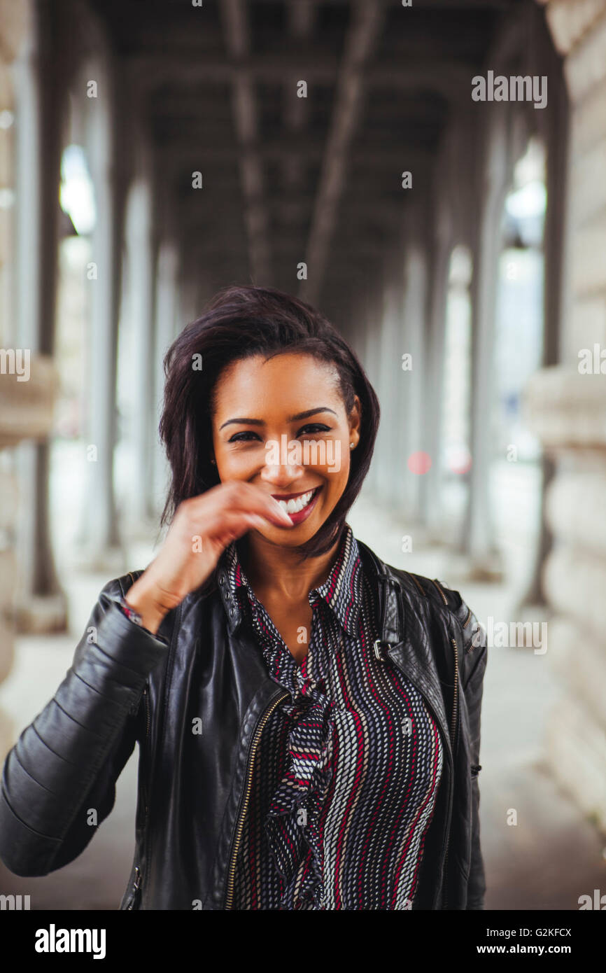 France, Paris, portrait of smiling young woman Stock Photo - Alamy