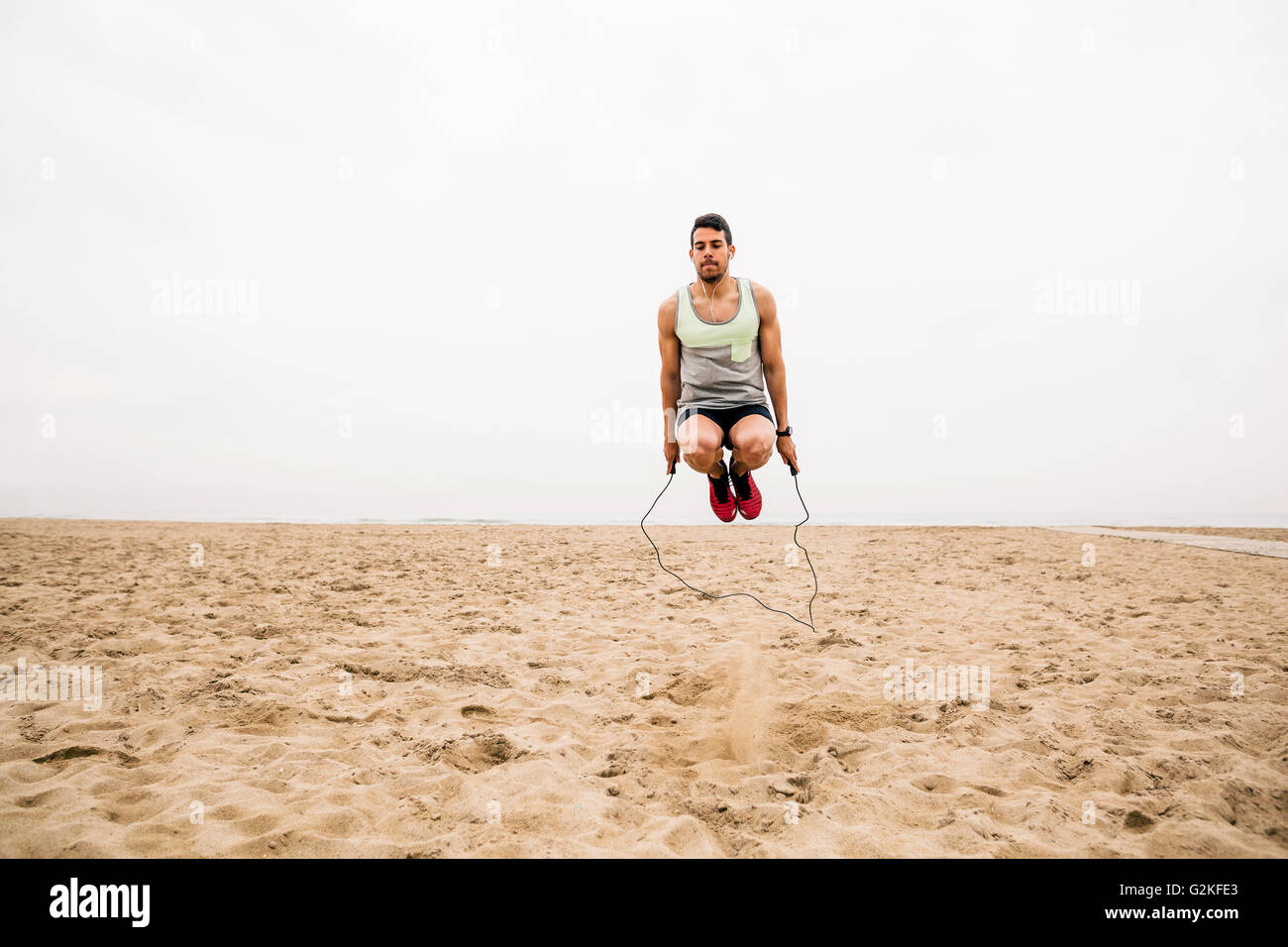 Man jumping rope and beach hi-res stock photography and images - Alamy