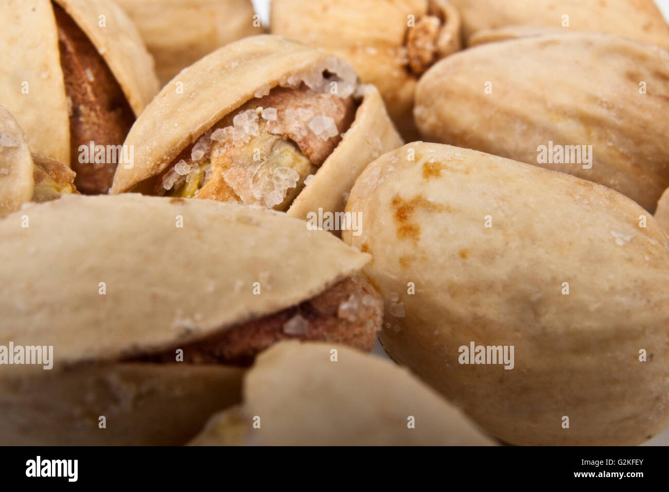fresh roasted pistatio closeup on white background Stock Photo - Alamy