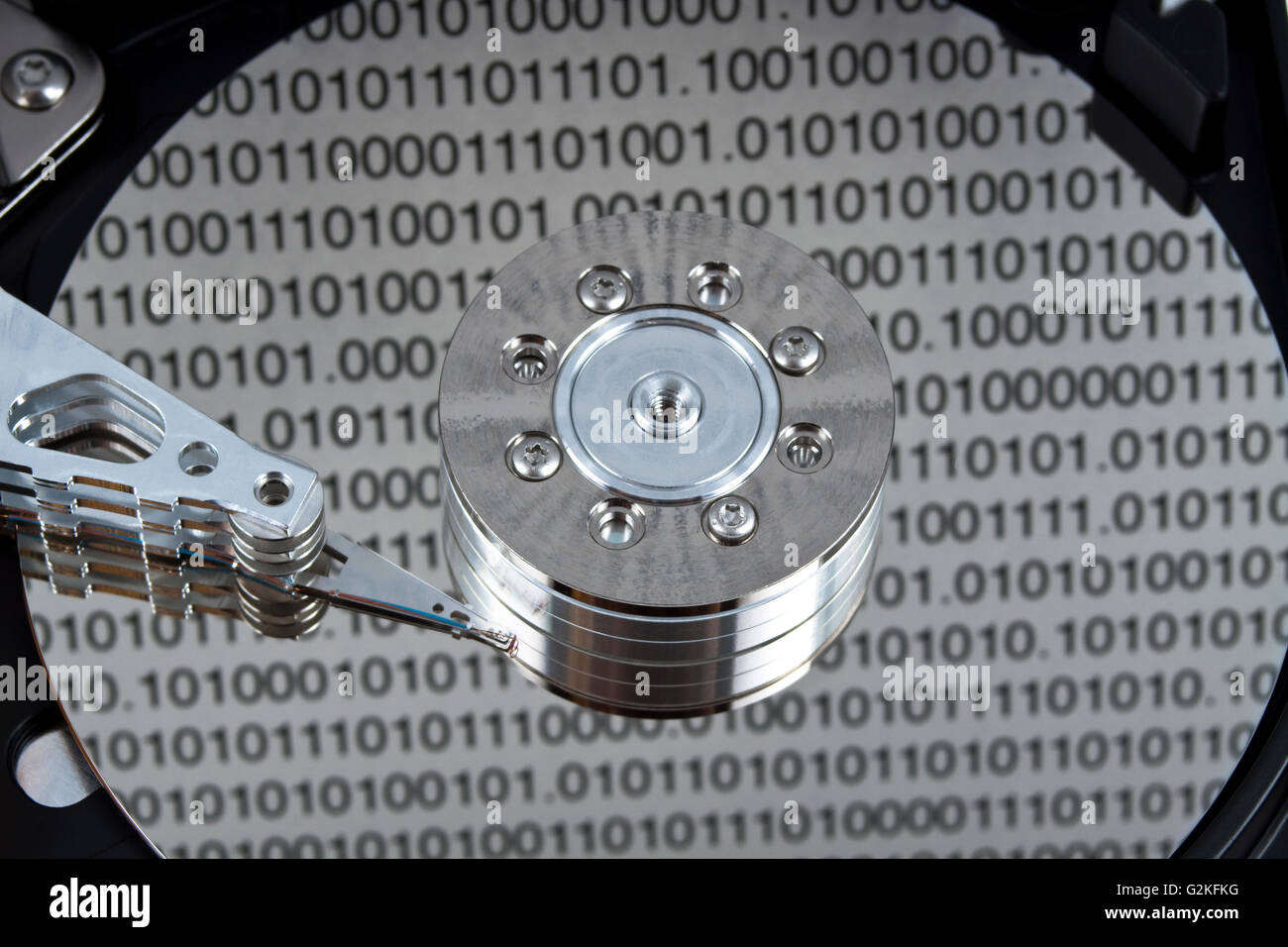 binary data reflection on an open hard drive disks Stock Photo - Alamy