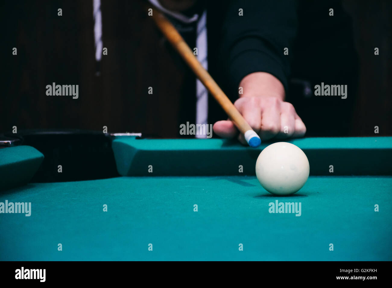 Hand of a man playing pool billard in a bar Stock Photo - Alamy