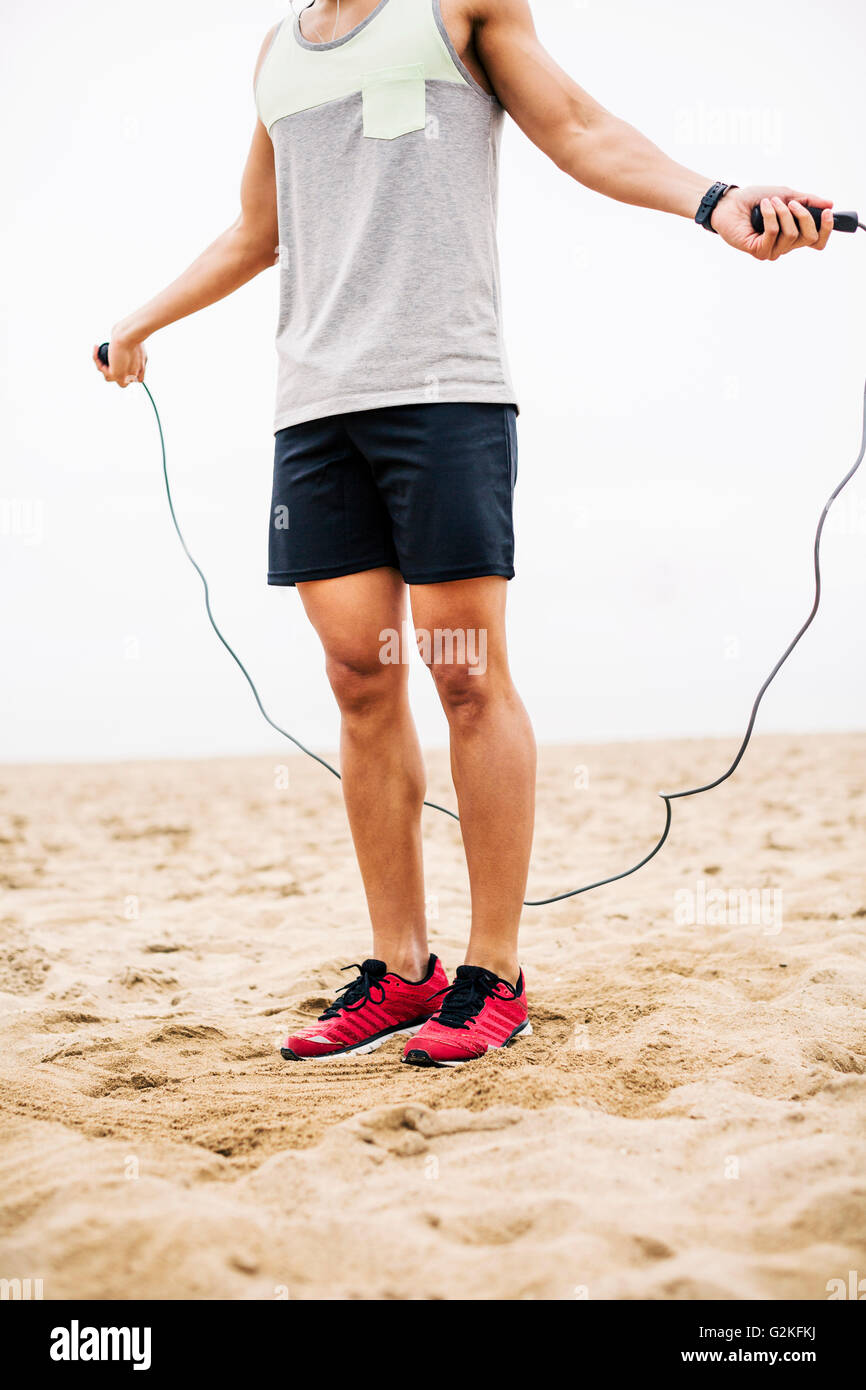 Man jumping rope and beach hi-res stock photography and images - Alamy