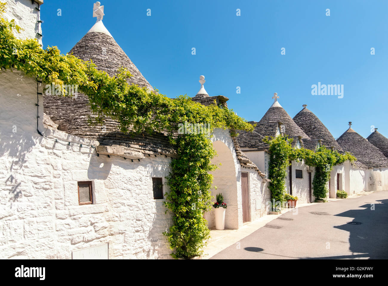 Italy, Apulia, Alberobello, Trulli, dry stone huts with conical roofs ...