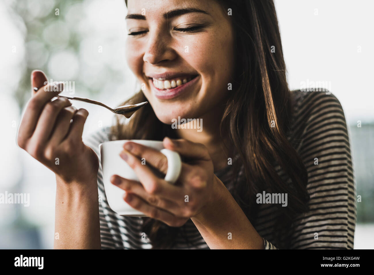 Spooning milk hi-res stock photography and images - Alamy