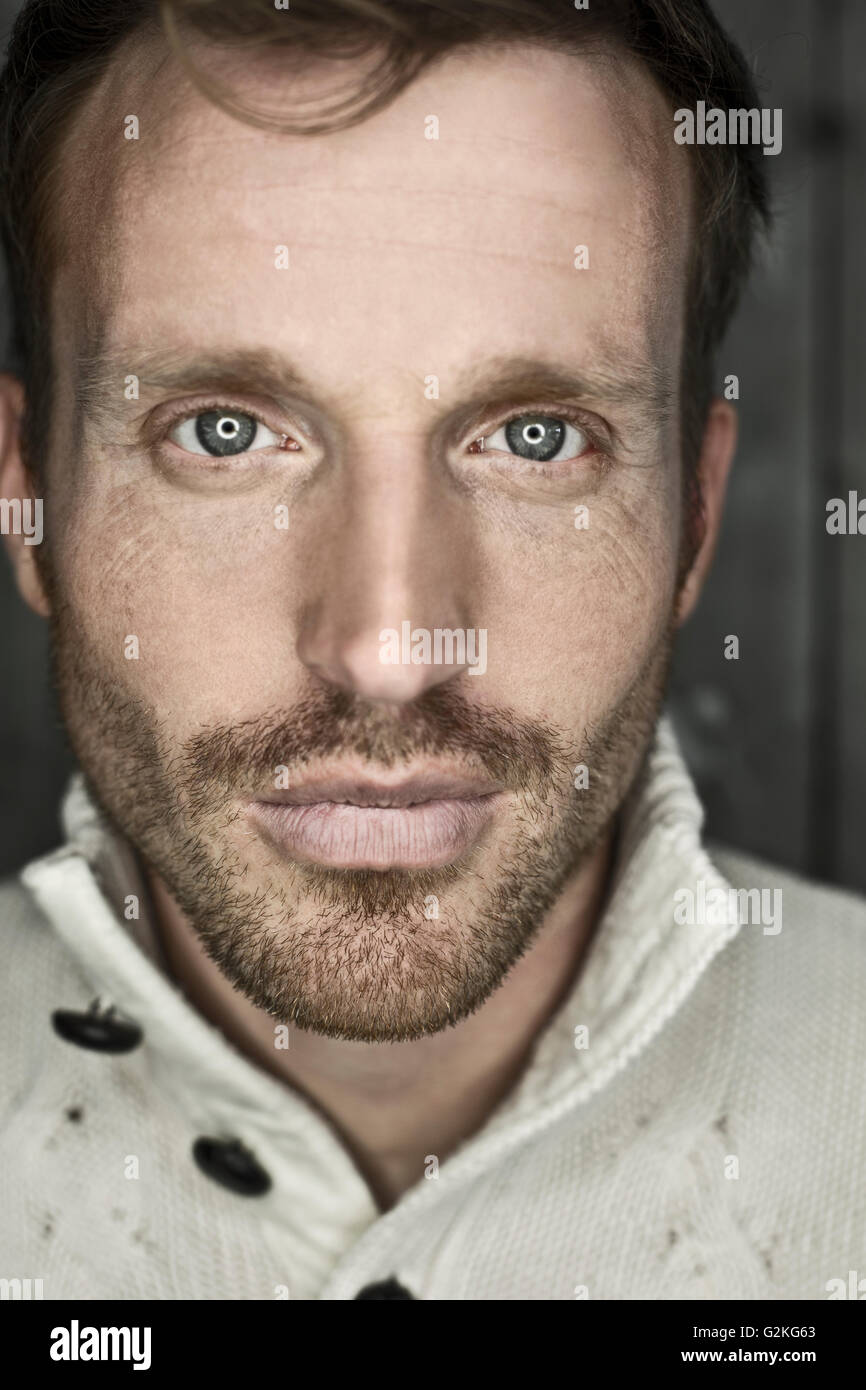 Portrait of staring man Stock Photo - Alamy