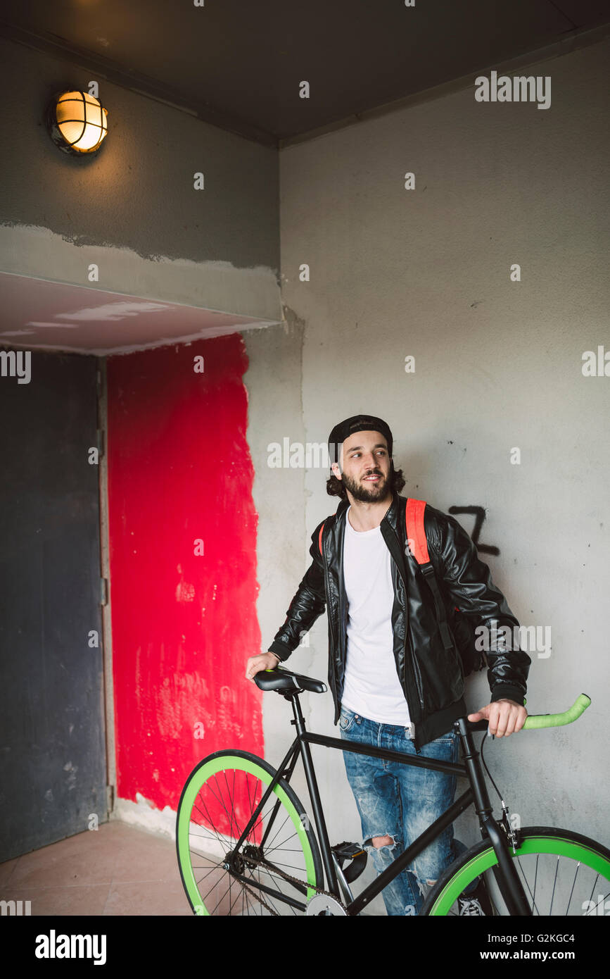Young man with fixie bike Stock Photo - Alamy