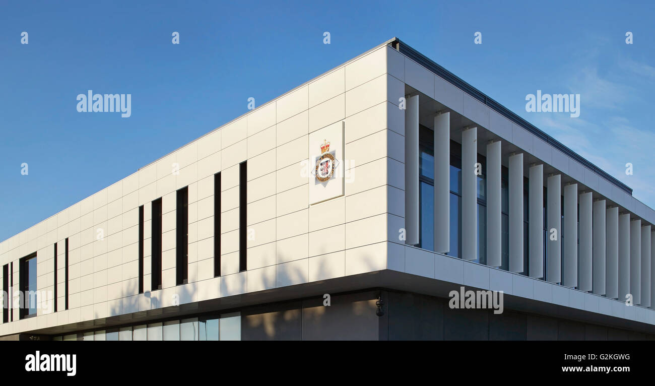 Corner elevation of first floor cladding with mullions and police ...