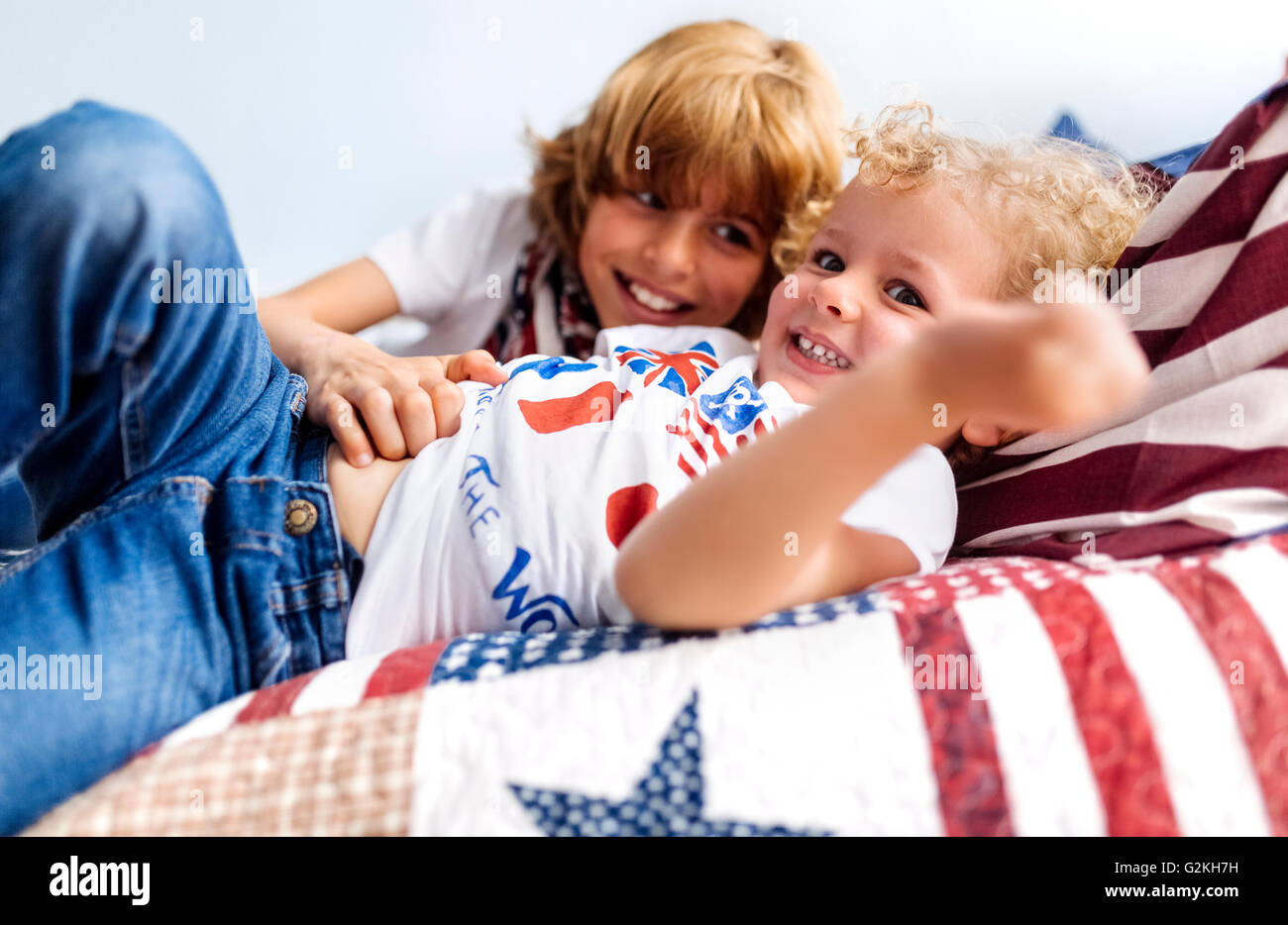 Two little brothers playing together at home Stock Photo - Alamy