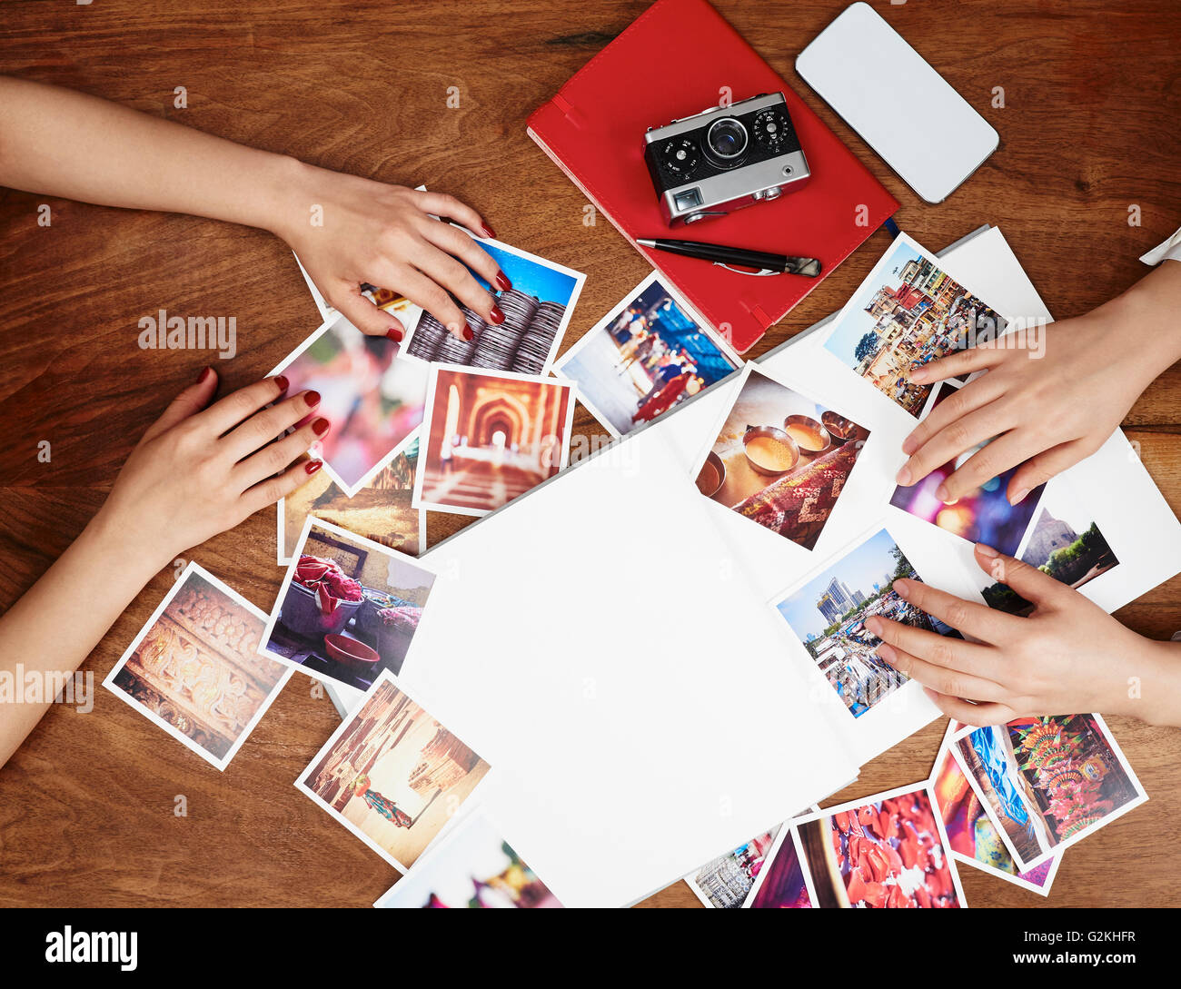 Hands sorting photo prints Stock Photo - Alamy