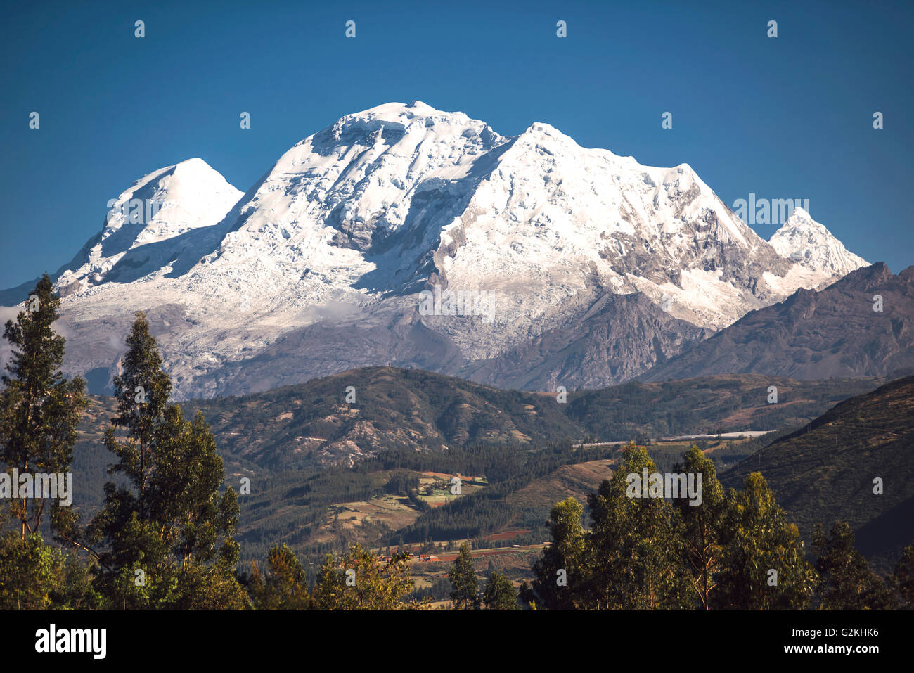 Peru, snow covered mountain peak in the Cordillera Blanca range of ...
