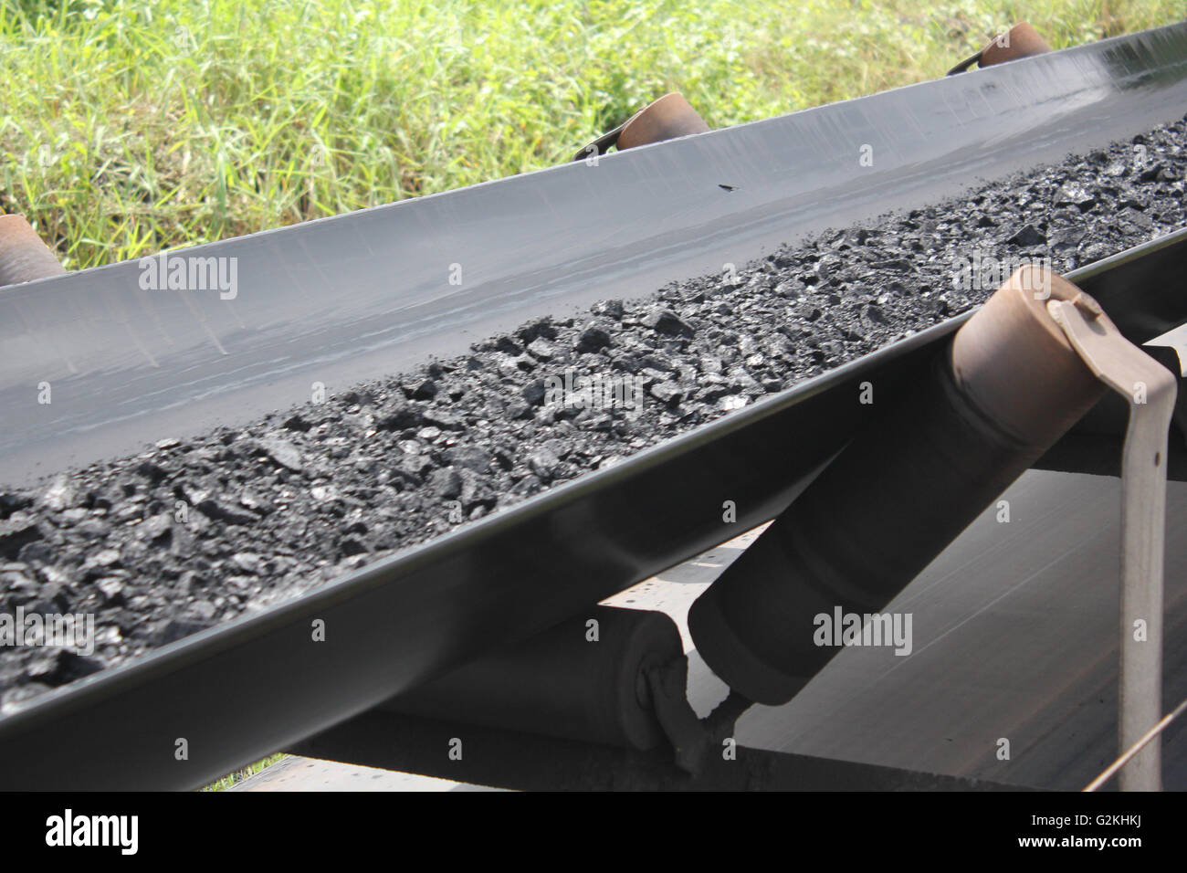 Black coal passing above belt conveyor to jetty Stock Photo - Alamy