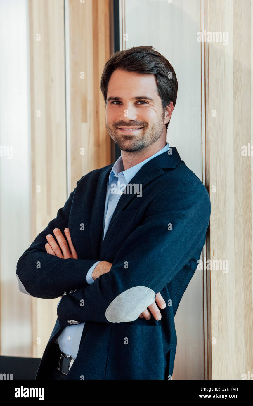 Portrait of confident businessman Stock Photo - Alamy